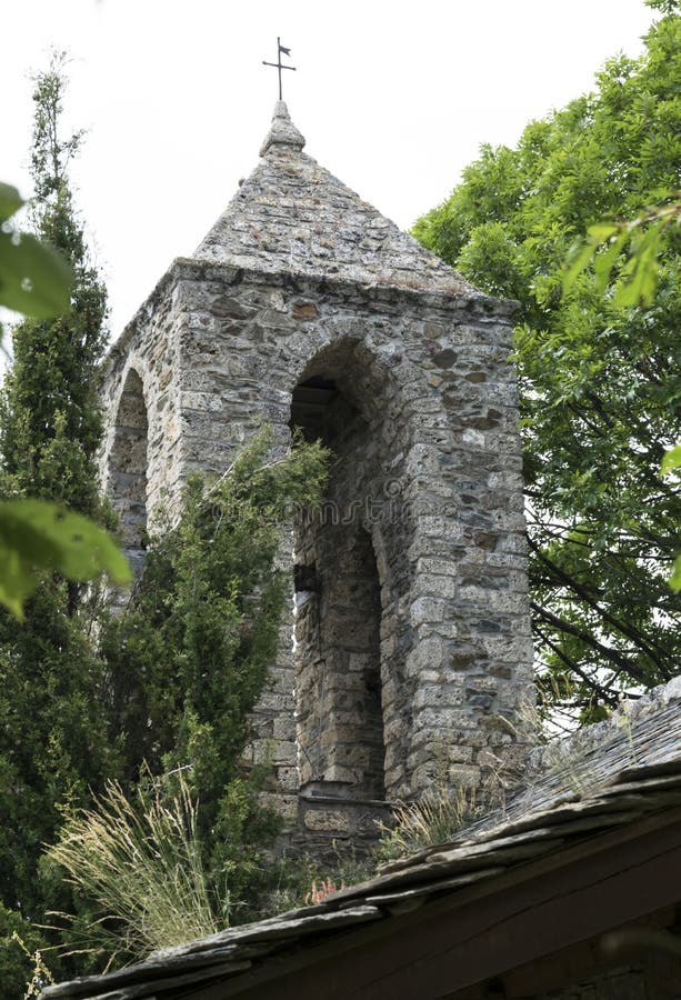 Belfry of a rustic church. stock photo. Image of church - 122348020