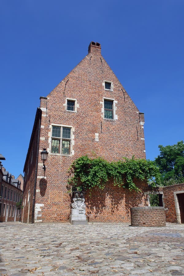 Belgian Medieval House with Water Pump Stock Photo - Image of ...
