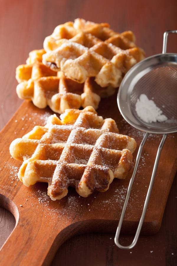 Belgian Waffles Sprinkled with Icing Sugar Stock Photo - Image of ...