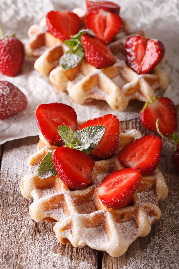 Belgian Waffles with Strawberries and Powdered Sugar Macro. Vert Stock ...