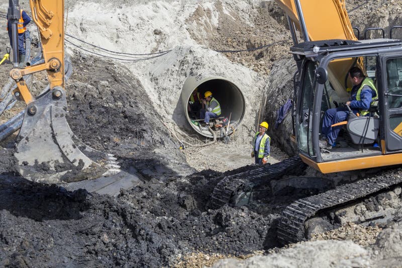 Construction Workers Resting in Big Pipe after Hard Work Editorial ...