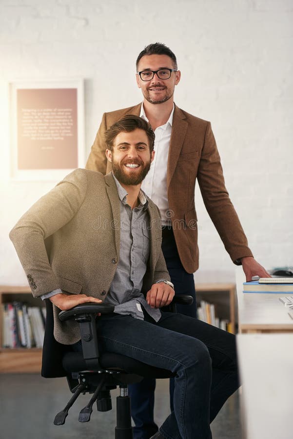 We Believe in Teamwork. Two Designers in an Office. Stock Image - Image ...