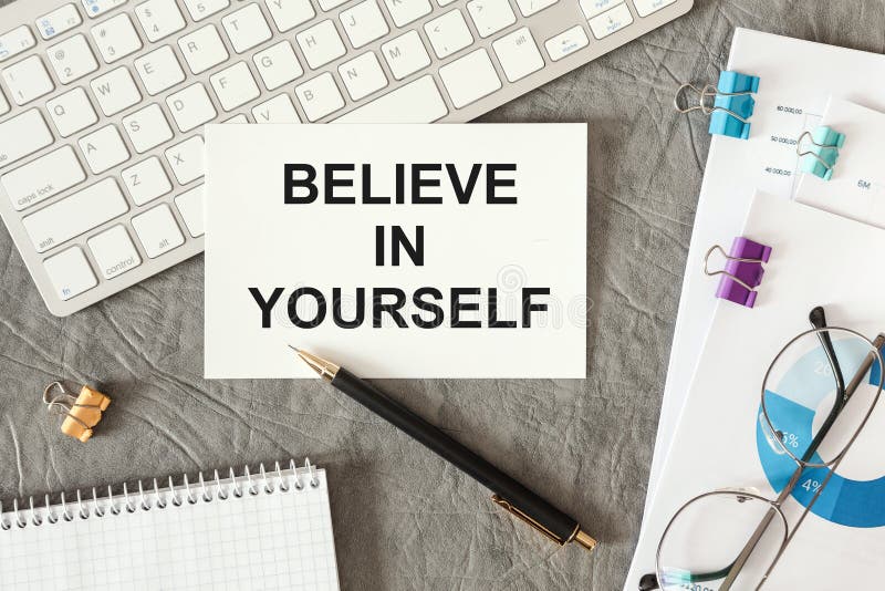 Believe in Yourself is Written in a Document on the Office Desk Stock ...