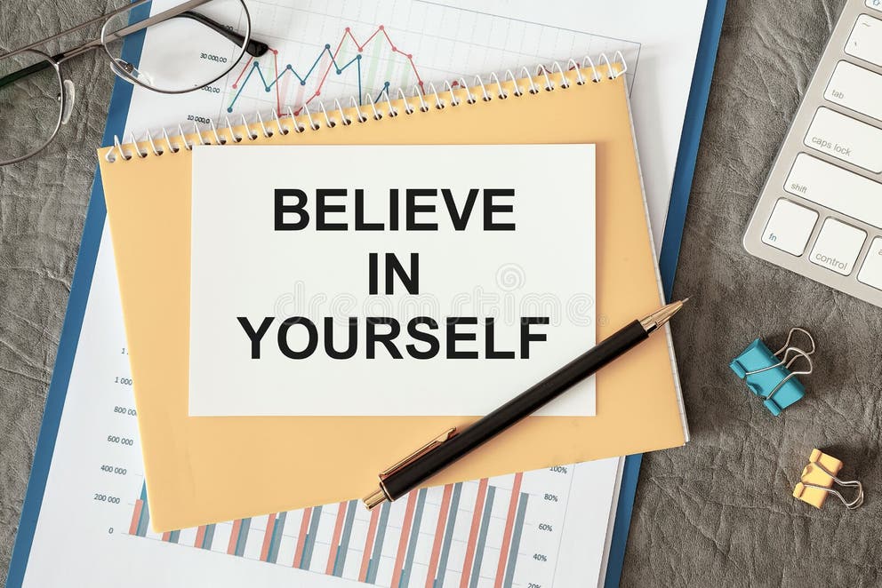Believe in Yourself is Written in a Document on the Office Desk Stock ...