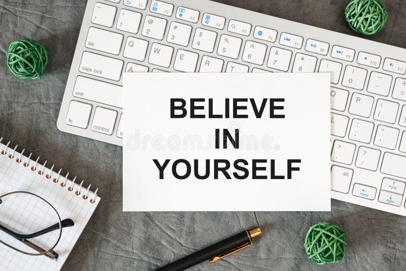 Believe in Yourself is Written in a Document on the Office Desk Stock ...