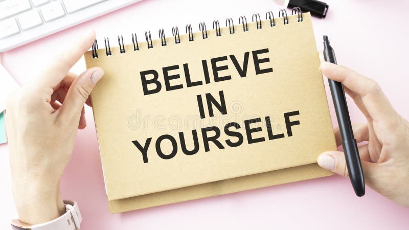 Believe in Yourself Written on an Yellow Sticky Note on a Cork Stock ...