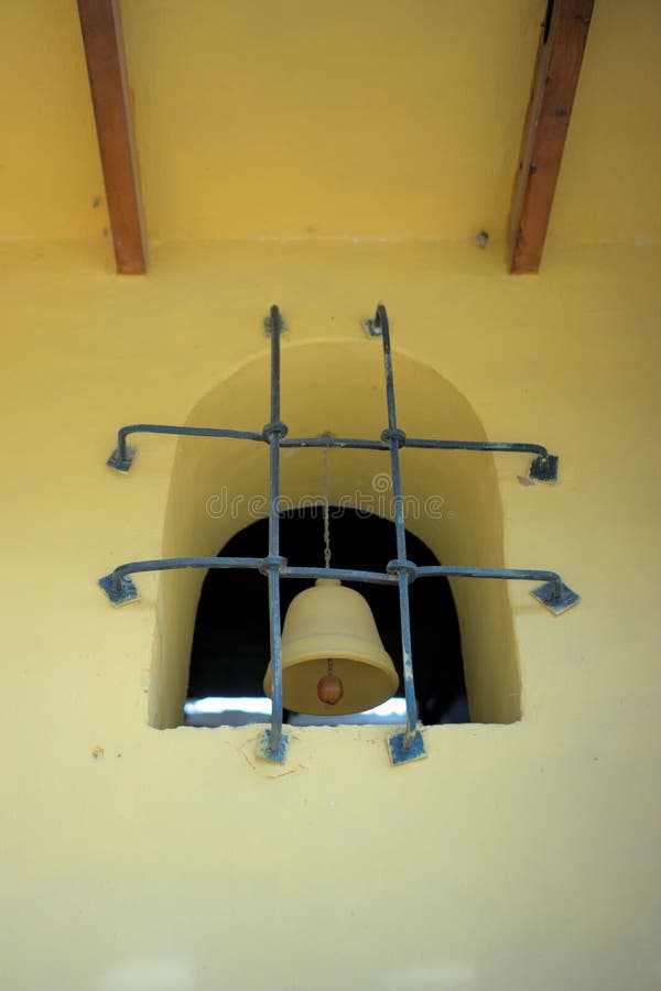 Bell Behind a Metal Grate stock image. Image of dark - 379119477