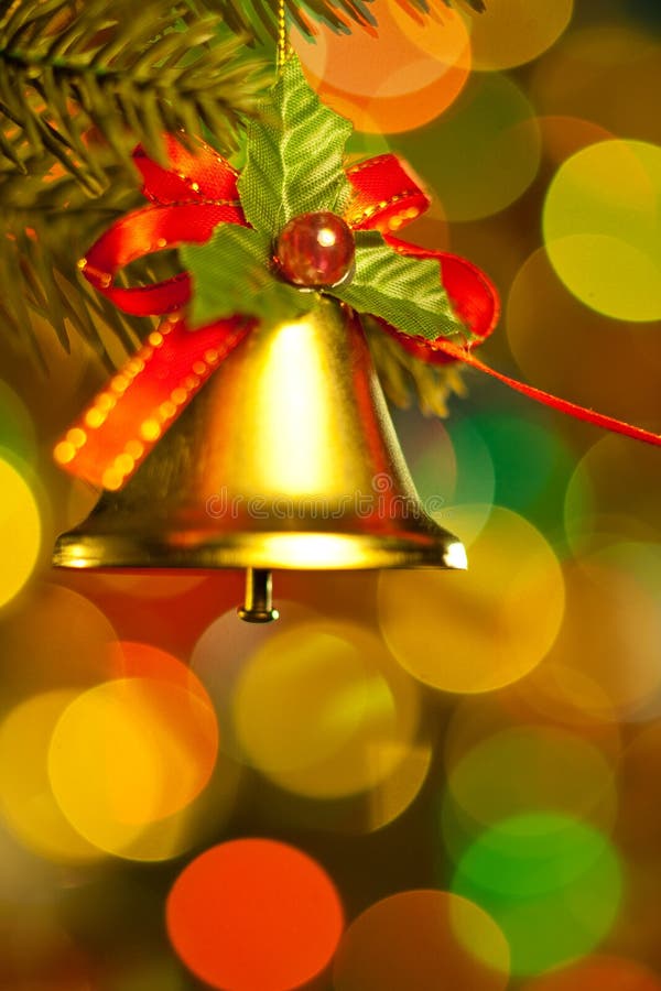 Bell on christmas tree stock image. Image of light, peaceful - 12019093
