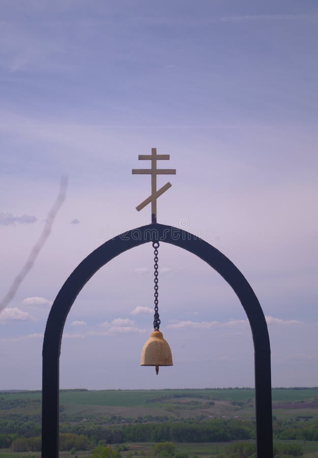 Bell and Cross on a Blue Sky Background Stock Image - Image of mast ...