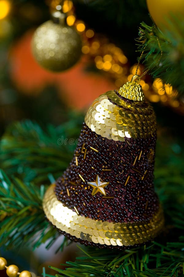 Bell Decoration on Christmas Tree Stock Image - Image of pineal, gold ...
