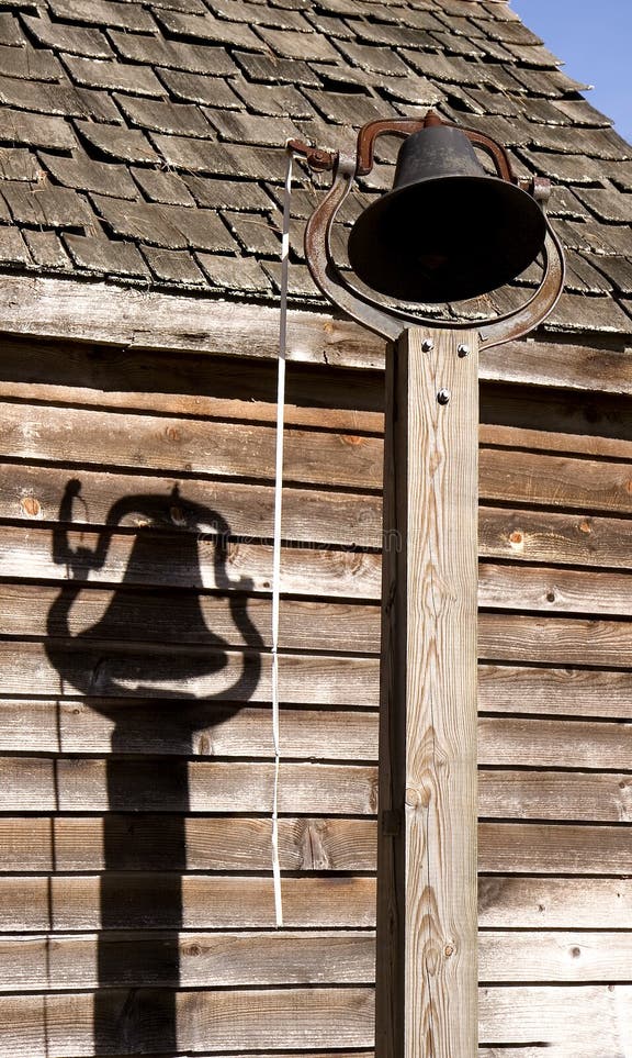 Bell and Shadow stock photo. Image of signal, dinner, barn - 4579394