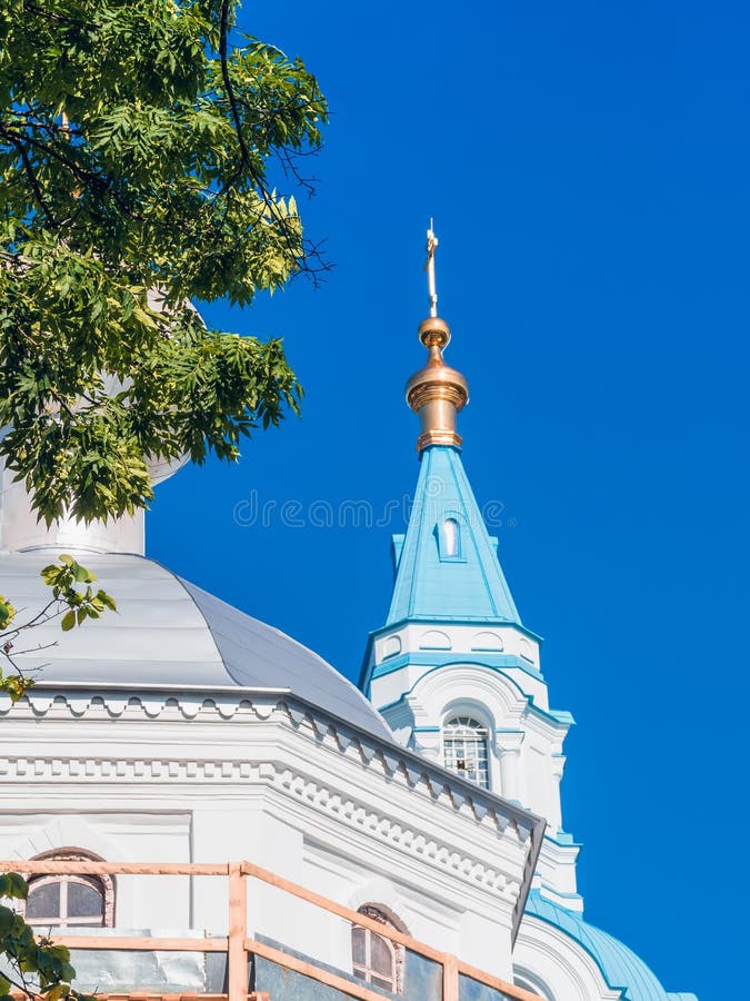 White Bell Tower and Blue Domes. on the Background of Clear Sky ...