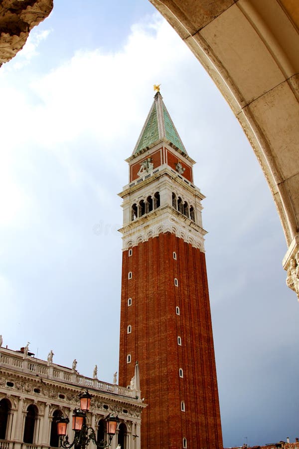 Bell Tower of Saint Mark with the Arch of the Ducal Palace Stock Photo ...