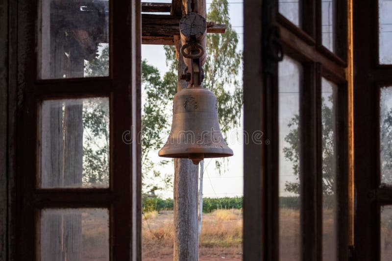 Aged Bronze Bell Seen from a Wooden Window Stock Image - Image of ...