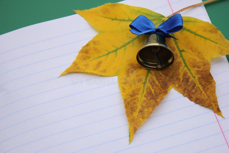 Bell, Yellow Maple Leaf and School Notebook - Symbols of the Beginning ...