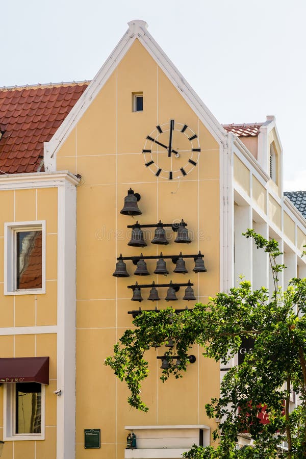 Bells and Clock on Yellow Curacao Church Stock Photo - Image of yellow ...