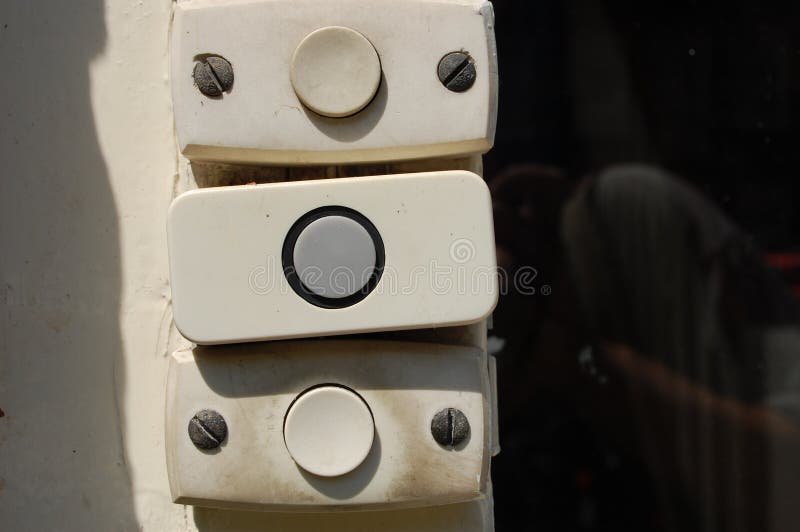 Bells on a door entrance stock photo. Image of button - 14966668