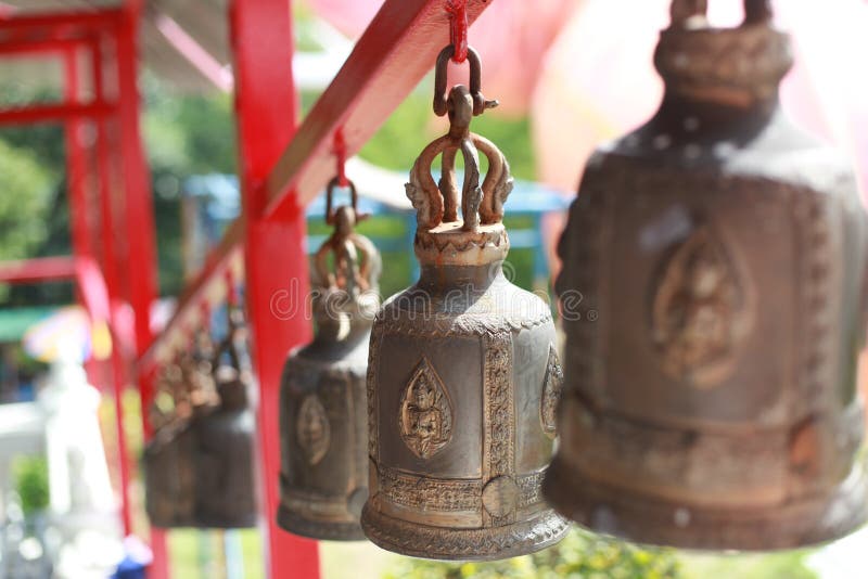 A Medium Sized Bell Adorned by Buddhist Temples. Stock Image - Image of ...