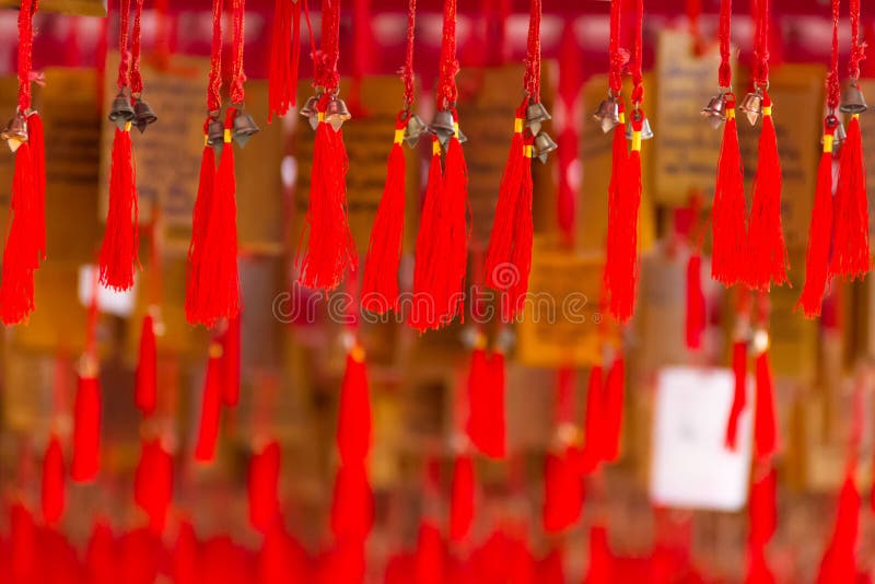 Bells with red thread stock photo. Image of ornament - 51863704