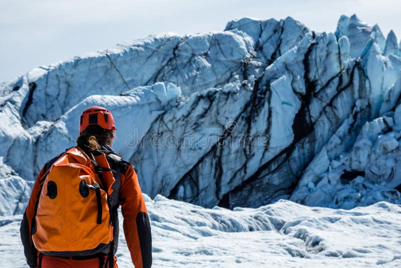 Walking Toward an Ice Cave with Deep Blue Ice on the Matanuska Glacier ...