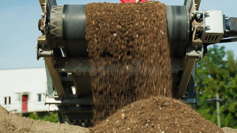 Belt Conveyor with Mixed Sand and Rocks Falling Off of it Stock Footage ...