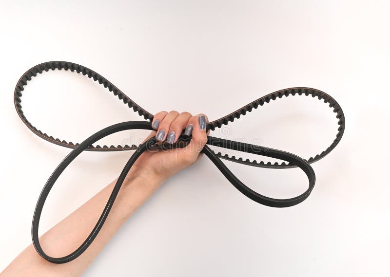 Belts for the Car. Spare Parts in Hand on a White Background Stock ...
