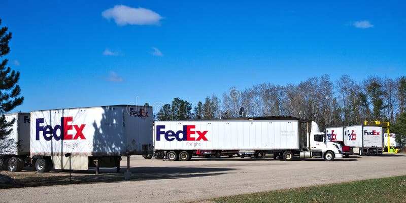 Fleet of FedEx Delivery Trucks in a Parking Lot Editorial Photography ... Fleet of FedEx Delivery Trucks in a Parking Lot Editorial Photography ...