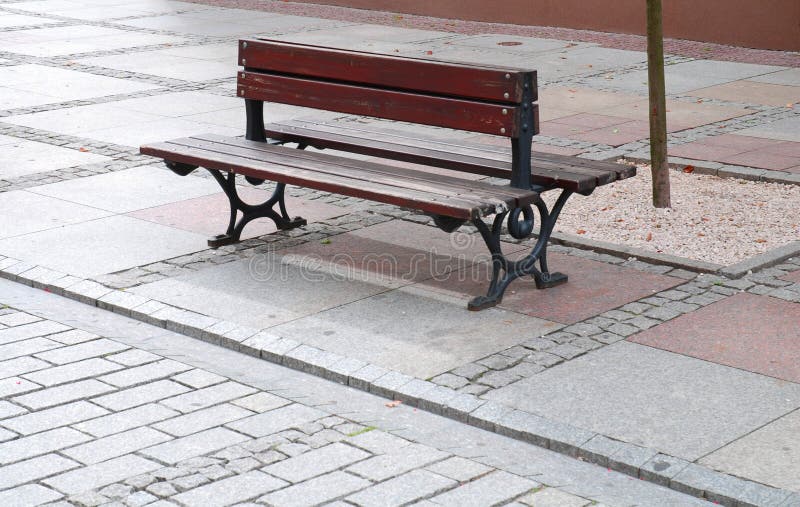 Bench stock image. Image of paint, brick, daytime, pavement - 6521029