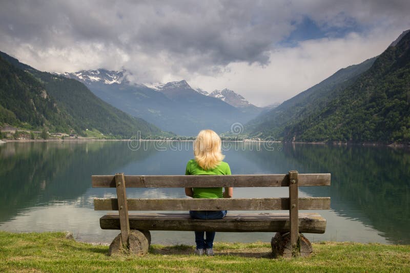Bench in Alps stock image. Image of cloud, peak, lonely - 27187963