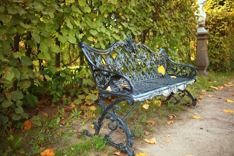 Bench in autumn garden stock image. Image of scene, autumn - 61164231