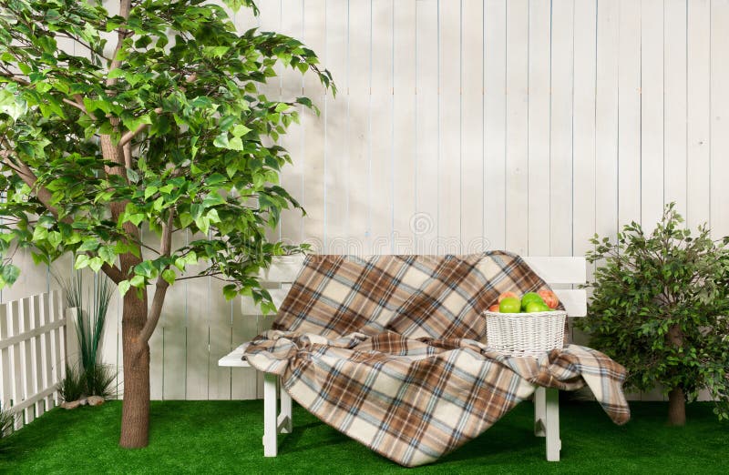 Bench with a Basket of Apples in the Garden Stock Image - Image of ...