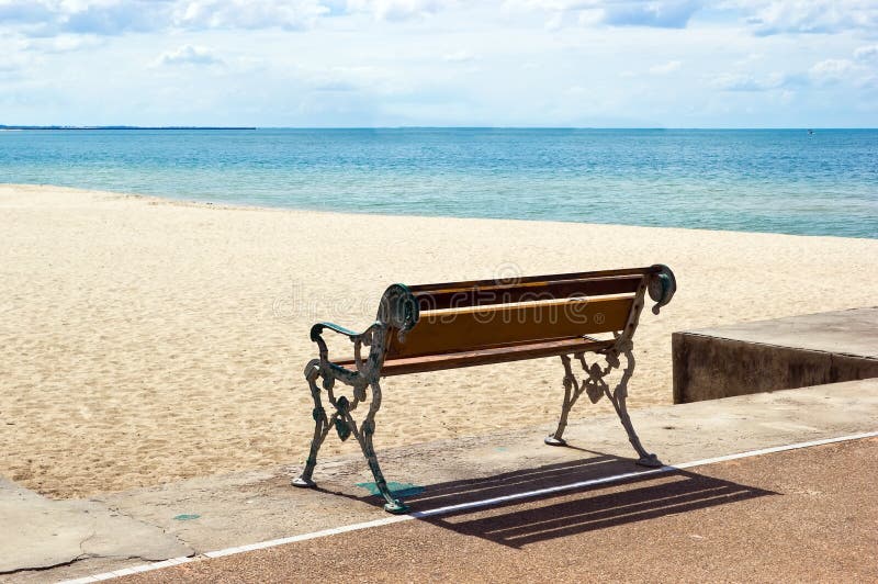 Bench on the beach stock photo. Image of view, destination - 26409812