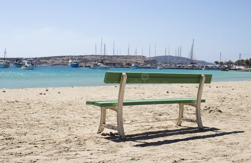 Bench on a beach stock photo. Image of resting, koufonisia - 291876980