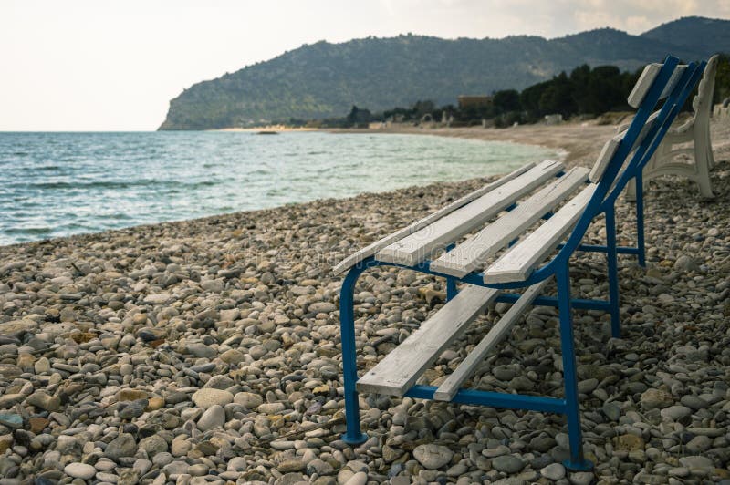 Bench on the beach stock photo. Image of back, travel - 51803930