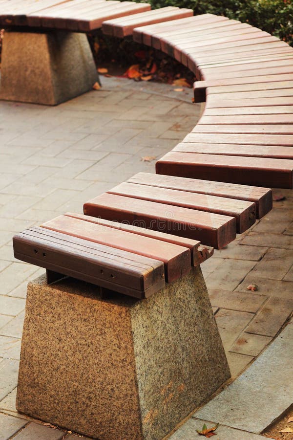 Bench chair in the park stock photo. Image of bush, brick - 36178566