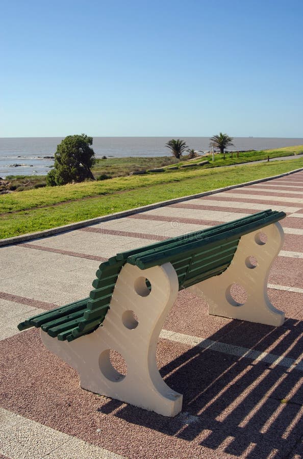Bench facing the beach stock image. Image of waves, view - 11471843