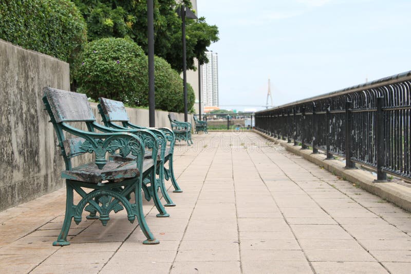 Bench on footpath stock image. Image of landscape, modern - 25912449