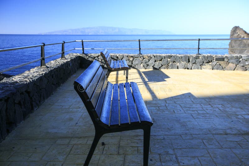 Bench in front of the sea stock image. Image of coast - 106918023