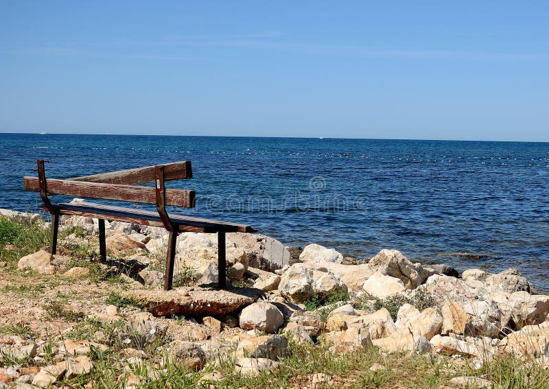 Bench in front of the sea stock photo. Image of front - 44221412