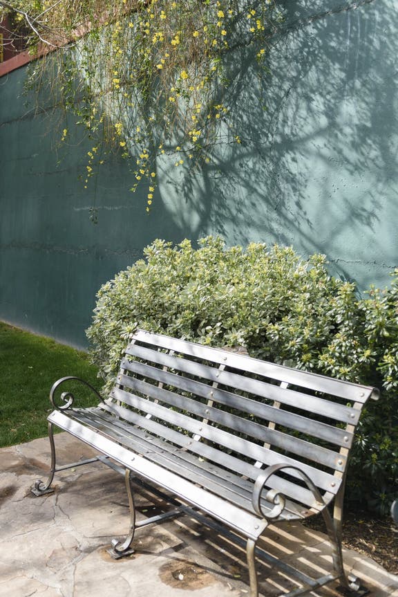 Old-fashioned Park Bench in a Garden Setting. Editorial Stock Photo ...
