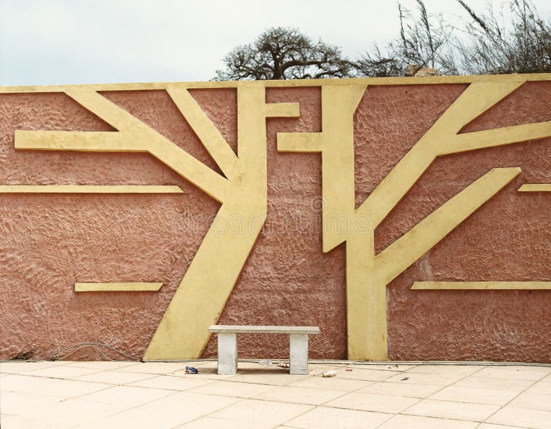 Bench with a Geometric Wall in the Background in Dakar Senegal Stock ...
