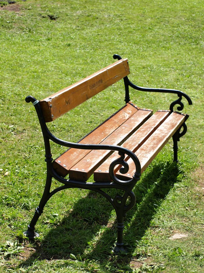 Bench in the grass stock image. Image of benches, woods - 5833733