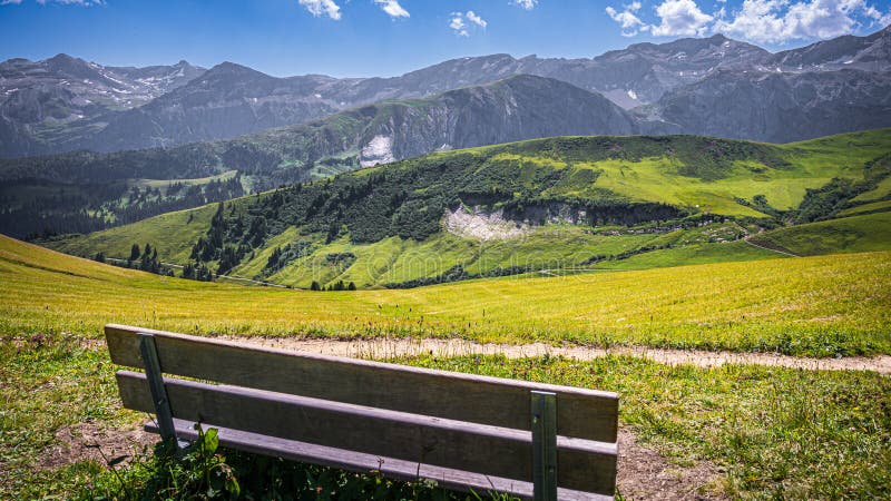 Bench on a Hiking Trail in the Swiss Alps Stock Photo - Image of calm ...