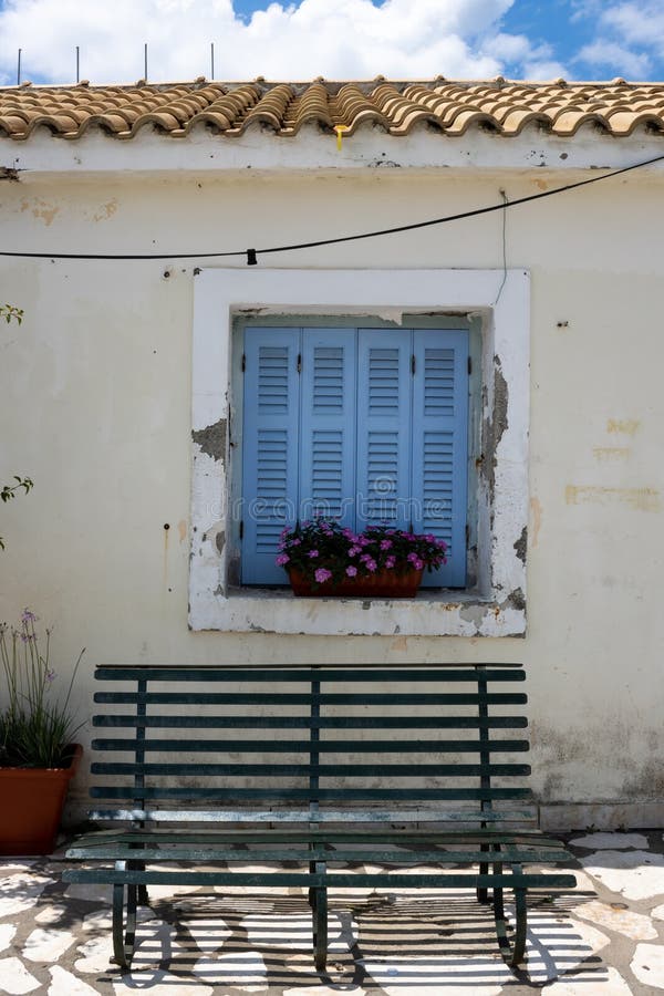 Bench Infront of the House with Shuttered Window Stock Image - Image of ...