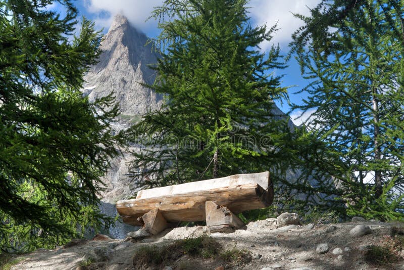 Bench in Italian Alps stock image. Image of mountain - 18311149