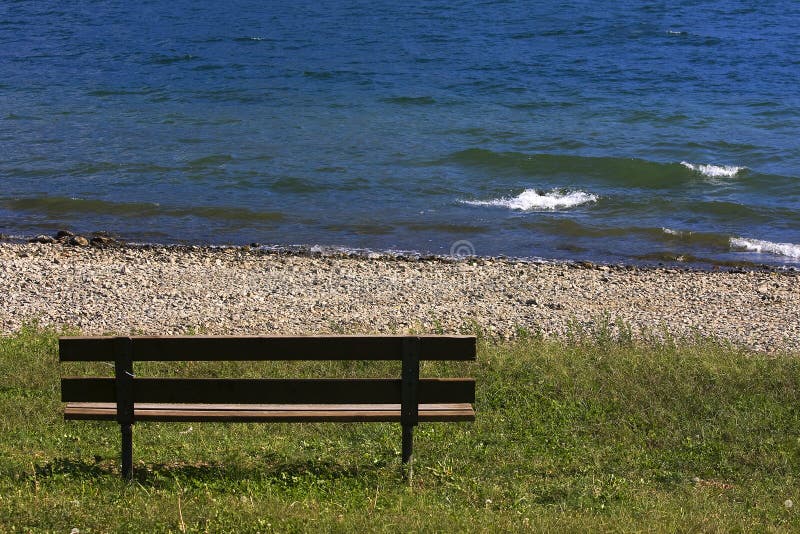 Bench at the lake stock image. Image of mountains, clouds - 11335923