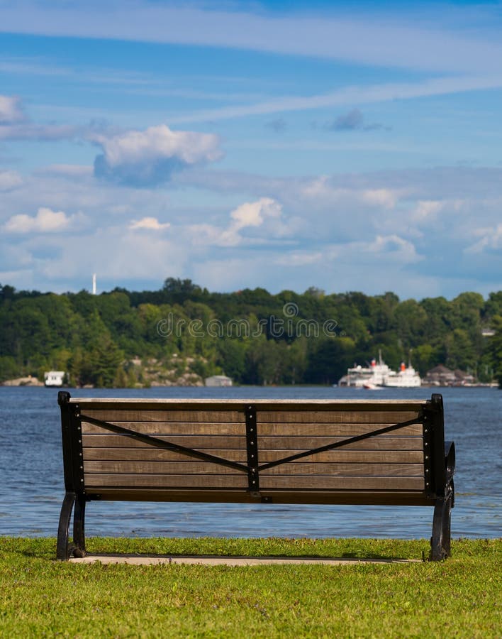 Bench at the lake shore stock image. Image of shore, shoreline - 43950423