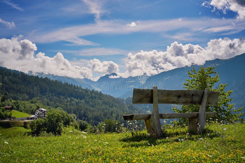 Red bench in Switzerland. stock photo. Image of vacation - 59844796