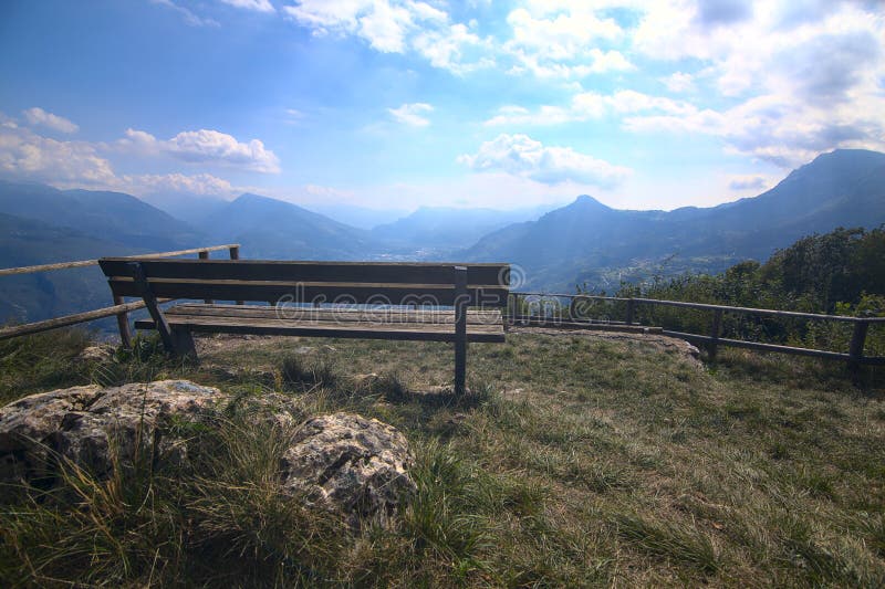 Bench by the Mountains with Mountain Range in the Distance and a Clear ...