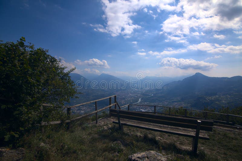 Bench by the Mountains with Mountain Range in the Distance and a Clear ...